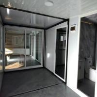 China 40 Ft Expandable Mobile Home with 2 Bedroom Expanding Container House and Steel Door for sale