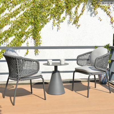 China Nordic Balcony Outdoor Cafe Tea Table And PE Rattan Chair Set Waterproof Fabric for sale