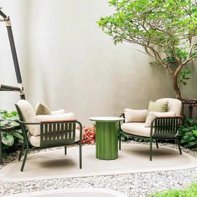 China Garden Sofa And Coffee Table Set With Teak Armrest And Metal Frame for sale