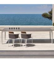China Waterproof UV Resistant Modern Outdoor Dining Set Plastic Wood Table And Handmade Wicker Chairs for sale