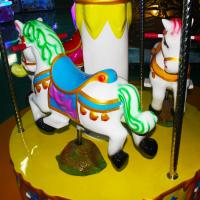 China Coin Operated Merry Go Round Kiddie Rides 3 Seats Mini Carousel For Kindergarten for sale