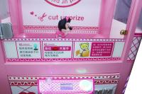 China Crazy Scissors Cut Toy Prize Doll Game Machine With LCD Display English Language for sale