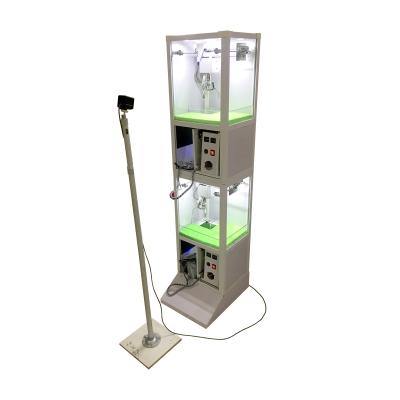 China Mini Online Claw Machine Double Layer Small APP Control Catch Boutique Dolls for sale