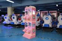 China Anti Shaking Metal Cabinet 4 Player Toy Catcher Machine for sale