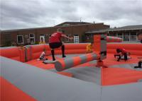 China Interactive Inflatable Sports Arena , Wipeout Bounce House Outdoor Activities for sale