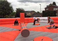 China Interactive Inflatable Sports Arena , Wipeout Bounce House Outdoor Activities for sale
