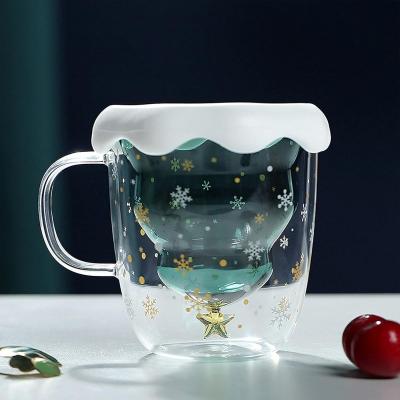 China Merry Christmas Reusable Double Wall High Borosilicate Glass Cup 300ml with Handle for sale