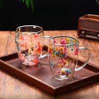 China Custom Logo Double Walled Coffee Cup 330ml High Borosilicate Glass with Dry Flower for sale