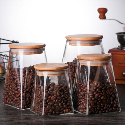 China Borosilicate Glass Storage Jar with Bamboo Lid Trapezoid Shape 500ml for sale