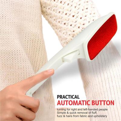 China Rotating Lint Brush with Replaceable Head 10.75 Inch Dual Sided Lint Remover for sale