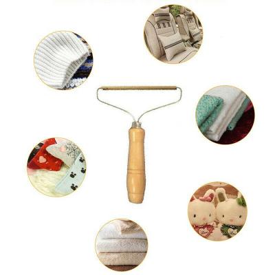 China Pure Copper Lint Roller 14cm Width Wooden Handle Fabric Shaver for Pet Hair and Lint Removal for sale