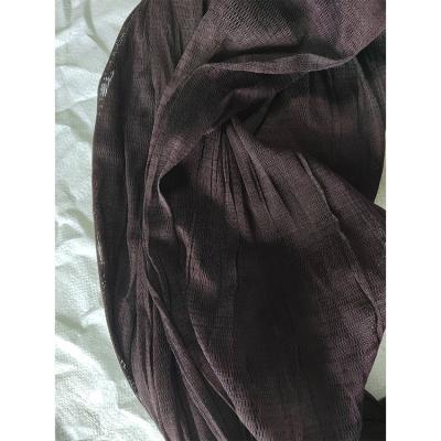 China Polyester 4PLY 8MM 1200MD Knotless Raschel Fishing Net Brown Strong Tanzania Market for sale