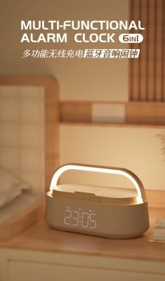 China Multifunctional Digital Alarm Clock with Wireless Charger Bluetooth Speaker 10W Night Light CE RoHS for sale