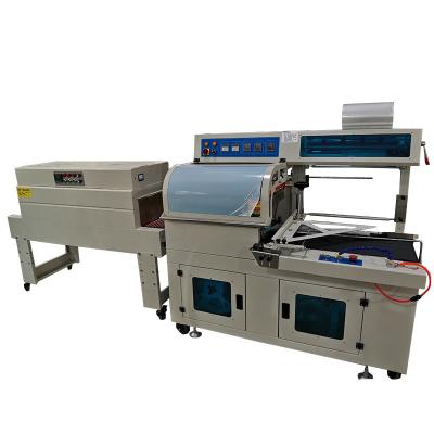 China Plastic Film Shrink Wrapping Packing Machine 26pcs/Min Shrink Film Making Machine for sale