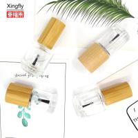 China 11ml Round Nail Polish Bottle With Wooden Cap UV Gel Empty Bottle Of Nail Polish Glue for sale