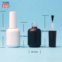China Custom 11ml Round White Black UV Gel Empty Nail Polish Glass Bottle With Brush Caps for sale