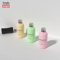 China 9ml Empty Nail Gel Polish Round Bottle Custom LOGO Nail Reinforced Gel Glass Bottle for sale