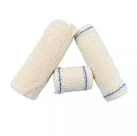 China Medical Cotton Bleached High Elastic Spandex Crepe Bandages Red Line for sale