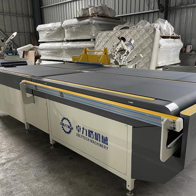 China High Speed Computerized Automatic Flipping Mattress Tape Edge Machine 50-500mm Sewing Thickness for sale