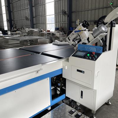 China Easy Operating Automatic Flipping Mattress Tape Edge Machine 50-500mm Sewing Thickness for sale