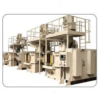 China Continuous Feed Tunnel Type Wire Mesh Shot Blasting Machine For Automotive Wheels for sale
