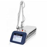 China Wrinkle Removal CO2 Fractional Laser Machine Portable 4D Facial Beauty Spa Equipment for sale