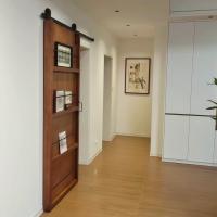 China American Custom Solid Wood Interior Door with Hidden Track and Sound Insulation for Bathroom Hotel Living Room for sale