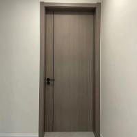 China Light Grey Slab Solid Wood Interior Door Minimalist Solid Wood Internal Door for Modern Apartments and Hotels for sale