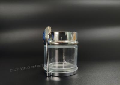 China 100ml Glass Cosmetic Cream Jar with Dosage Control Spoon - Transparent Cylinder Design & Screw Top Seal for sale