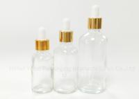 China Transparent Essential Oil Dropper Bottle 50ml Round Glass Container with Silicone Seal for sale