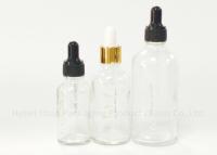 China Transparent Essential Oil Dropper Bottle 50ml Round Glass Container with Silicone Seal for sale