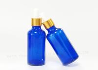China Blue Glass Oil Dropper Bottle 10ml to 100ml with UV Protection and Blow Molding Technology for sale