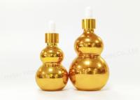 China Leak Proof Recycling Essential Oil Dropper Bottles 50ml 100ml Glass with Gold Finish and Custom Logo Options for sale