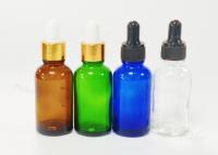 China Transparent Essential Oil Dropper Bottle 50ml Round Glass Container with Silicone Seal for sale
