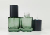 China Green Glass Perfume Bottles 50ml Bulk Cylinder Shape - 4.6cm Diameter 10.1cm Height with Custom Logo Options for sale