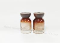 China Brown Round Glass Aromatherapy Bottle 120ml with 5.7cm Diameter for Essential Oils and Fragrance Dispensing for sale