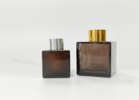 China Amber Glass Aromatherapy Bottle 30ml 50ml 100ml Square Design with Screw Cap for Essential Oils for sale