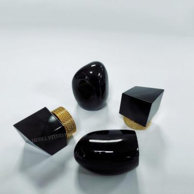 China Special Shaped Black Plastic Perfume Bottle Cap 15mm Caliber for sale