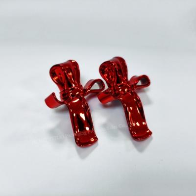 China Bow Shape Plastic Perfume Bottle Cap 15mm Press Pump Top 60mm x 75mm Red Cosmetic Packaging for sale