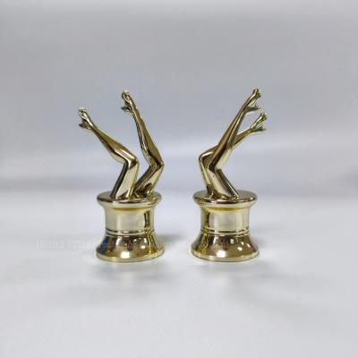China Durable Plastic UV Beautiful Legs Perfume Bottle Cap with 500-1200 Bar Injection Molding and ±0.05mm Tolerance for sale