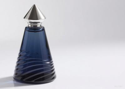 China Custom Blue Glass Perfume Bottle 30ml with 4.6cm Outer Diameter and Wave Relief Design for Luxury Fragrance Packaging for sale
