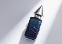 China Custom Blue Glass Perfume Bottle 30ml with 4.6cm Outer Diameter and Wave Relief Design for Luxury Fragrance Packaging for sale