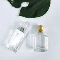 China 1 Oz Clear Refillable Glass Perfume Bottle with Spray/Pump Cap - OEM Logo Customization Available for sale