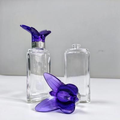 China Custom Butterfly Glass Perfume Bottles 5ml-100ml Capacity with Zinc Alloy Caps for Home Decoration for sale
