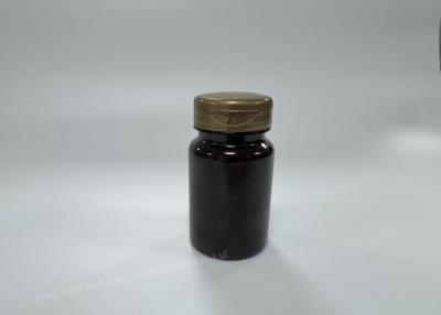 China 20ml Food-Grade Plastic Medicine Bottle with Dark Brown Body and Gold Cap - 2.4cm Width for sale