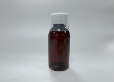 China 100ml Amber Plastic Medicine Bottle with Measuring Cup - GMP Certified Pharmaceutical Packaging for sale