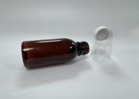 China 100ml Amber Plastic Medicine Bottle with Measuring Cup - GMP Certified Pharmaceutical Packaging for sale