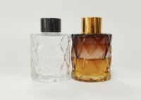 China Transparent Embossment Glass Reed Diffuser Bottles 30ml 50ml 100ml with 8.3cm Height Blow Molding for sale