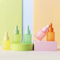 China 30ml Colorful Frosted Glass Essential Oil Bottles with Dropper Caps - UV Protection in Multiple Colors for sale