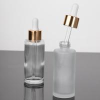 China Bulk Essential Oil Dropper Bottles 2oz Clear Glass with Custom Logo - 20ml to 120ml Sizes for sale